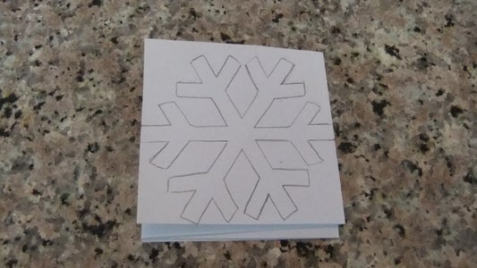 Paper Chain Snowflakes 4 Steps with Pictures Instructables paper-chain-snowflakes-4-steps-with-pictures-instructables